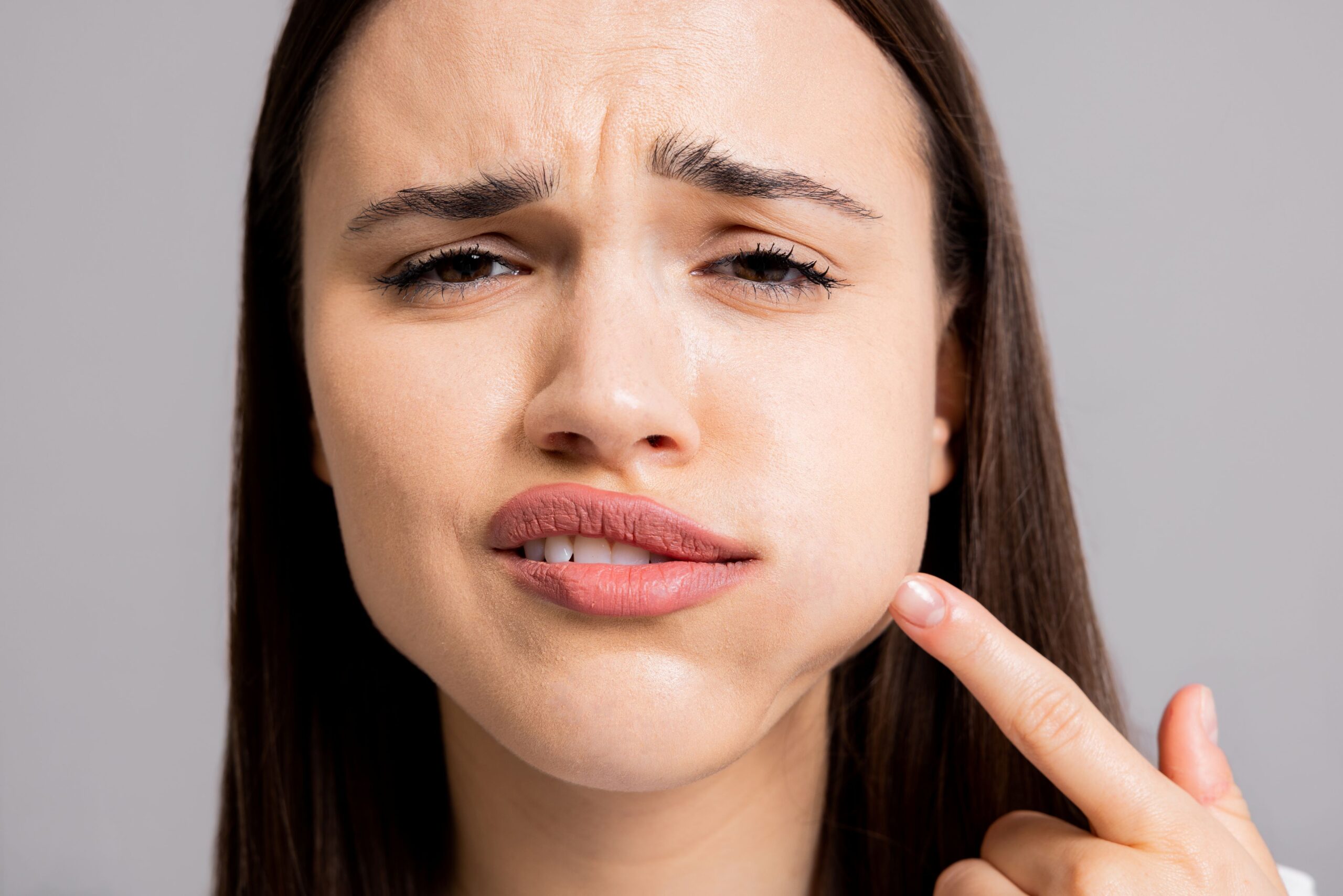 Facial Fiasco: Who Do I Call If My Cheeks Swell? | Compass Dental